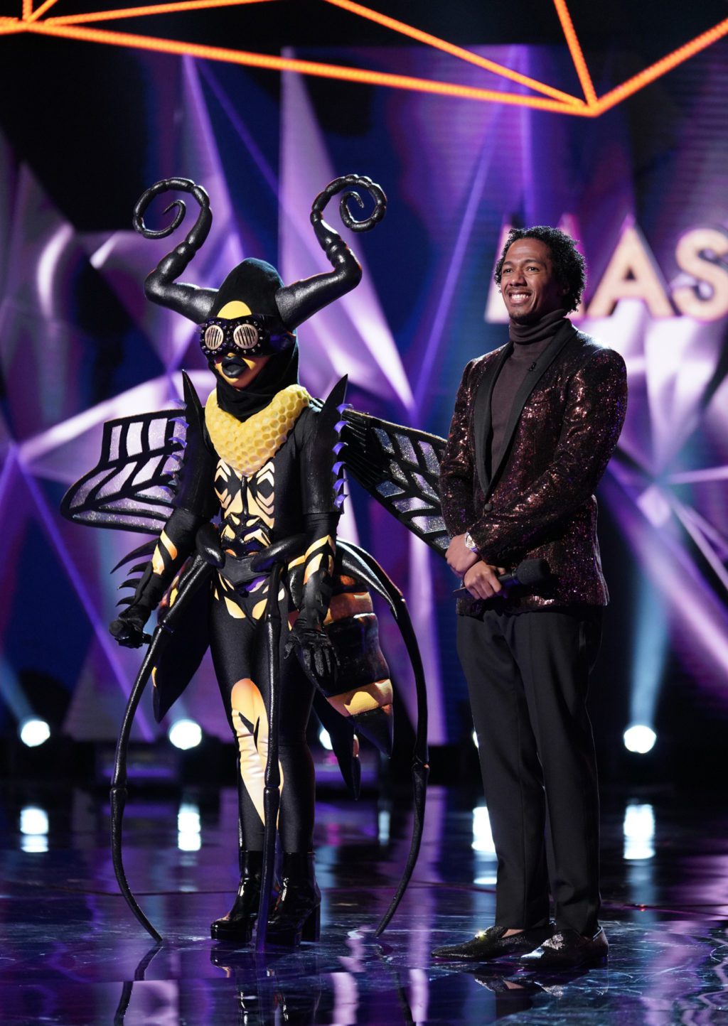 The Masked Singer Bee Costume and Host, Nick Cannon on Episode 2 ...
